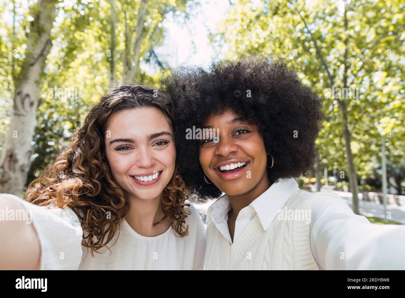 Portrait two happy female multiracial hi-res stock photography and images - Alamy