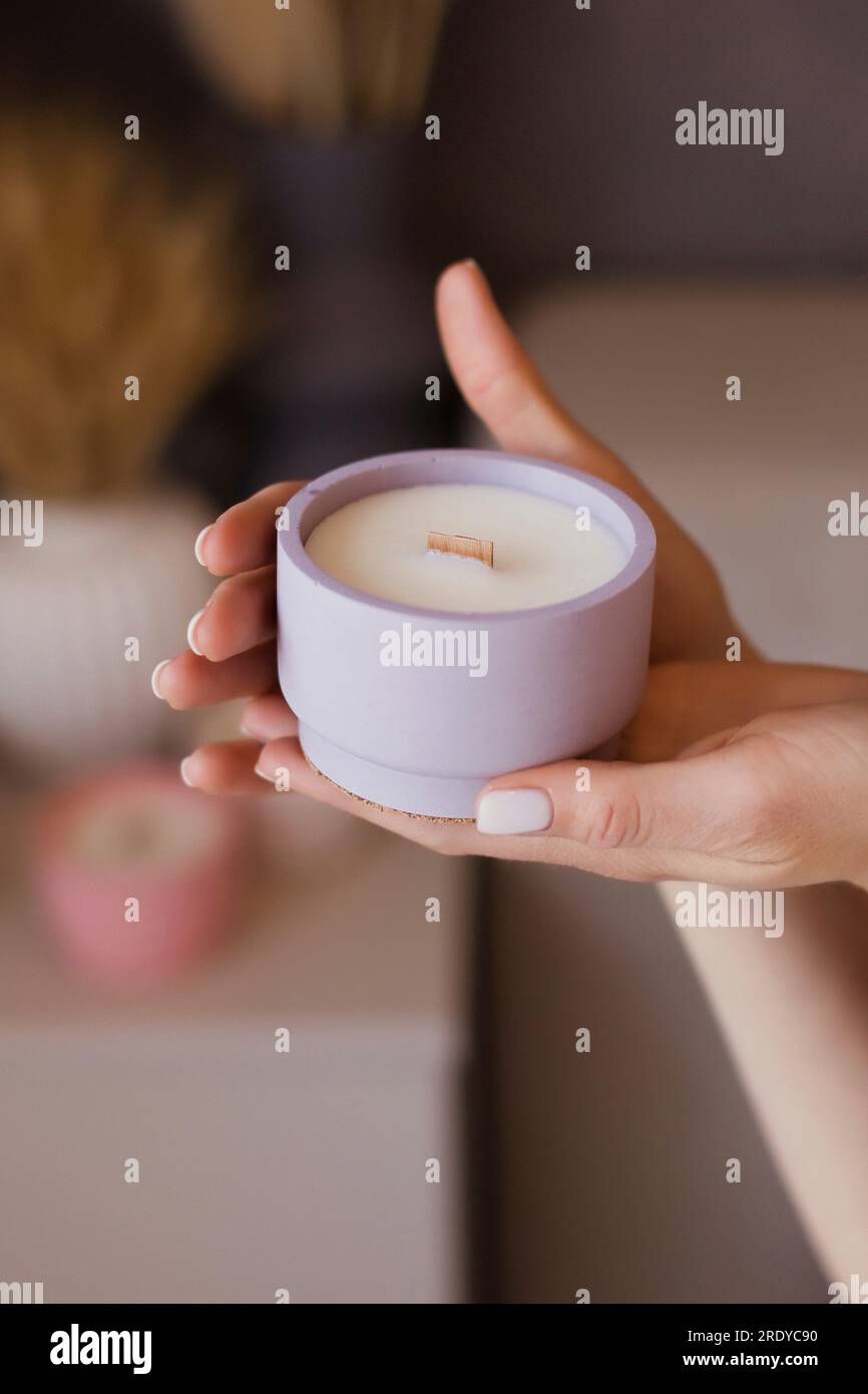 Hands holding candle hi-res stock photography and images - Alamy