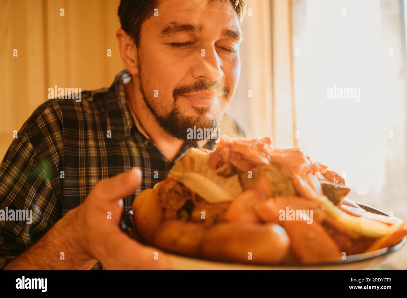 Chef smelling freshly made stewed vegetables at home Stock Photo - Alamy