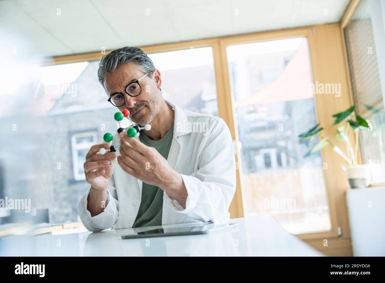 Scientist researching on molecular structure in laboratory Stock Photo - Alamy