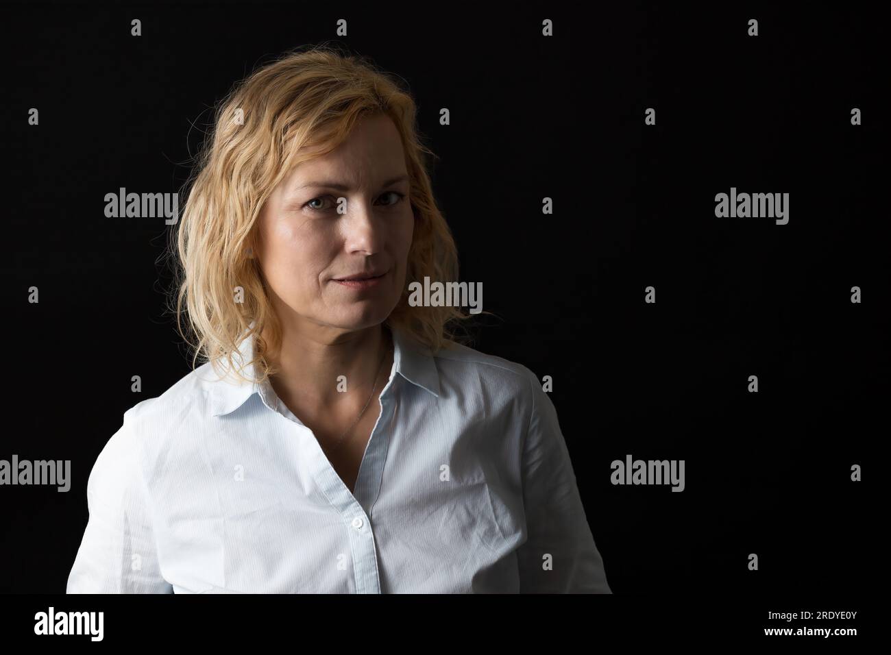 Low key portrait of middle age woman. Horizontally Stock Photo - Alamy