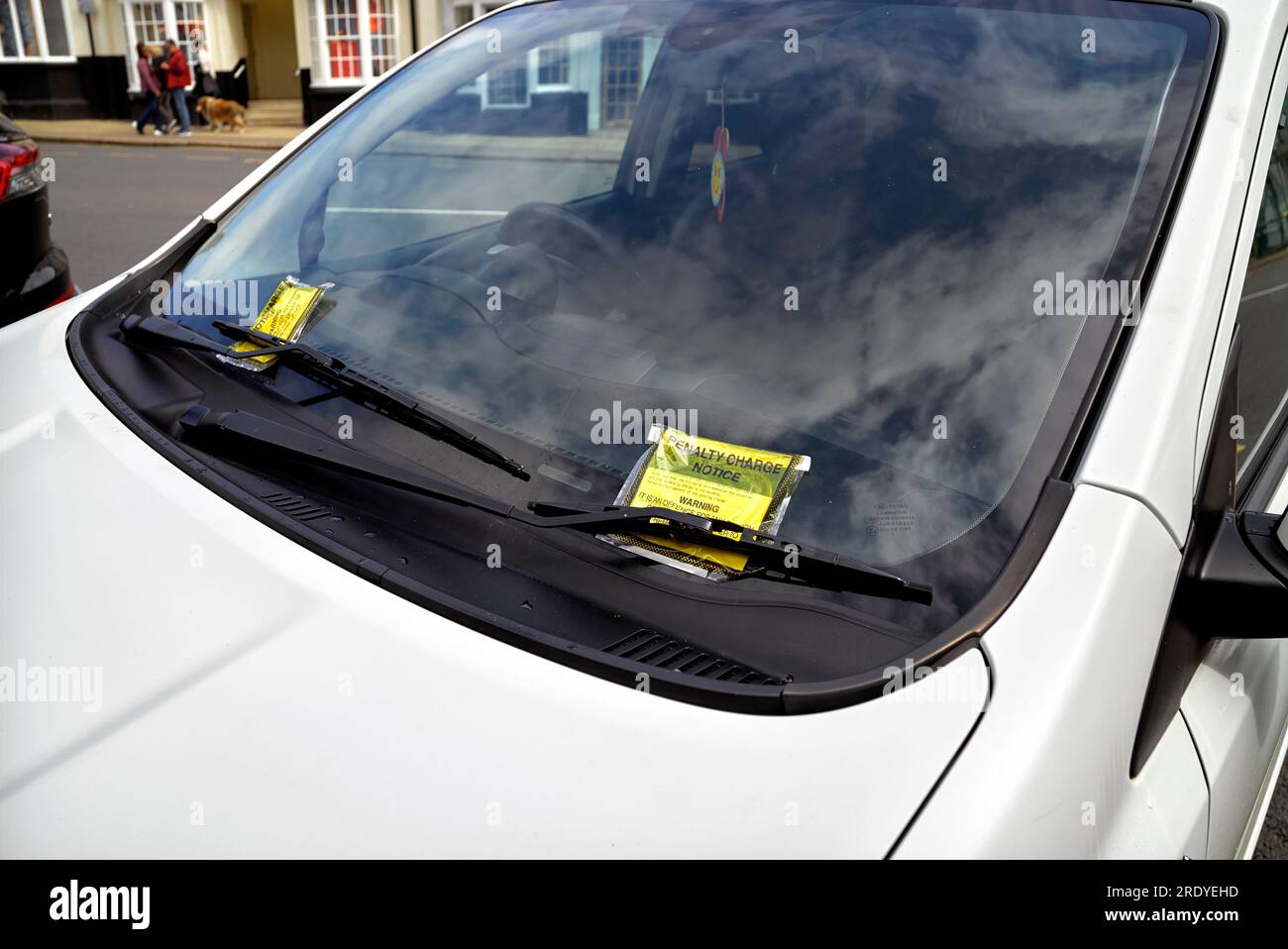 Two parking tickets on a car windscreen. England, UK. traffic ticket ...