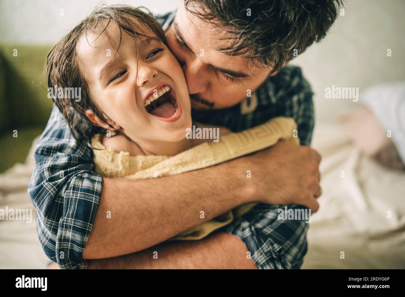 Father hugging his son hi-res stock photography and images - Alamy