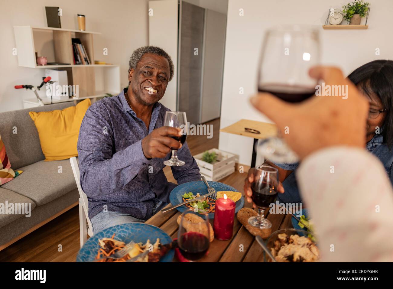 African friends enjoying dinner party hi-res stock photography and ...