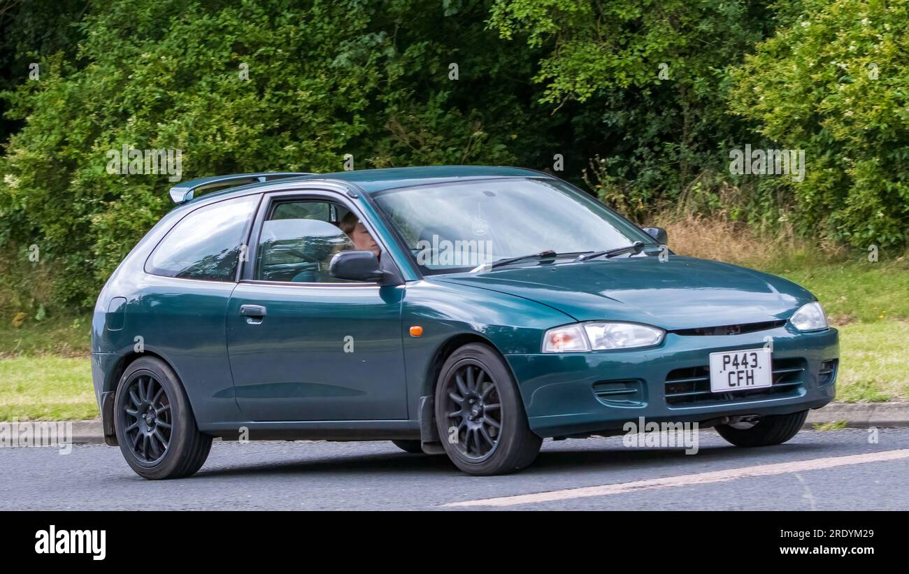 Milton Keynes,UK - July 21st 2023: 1997 Mitsubishi Colt car driving on ...