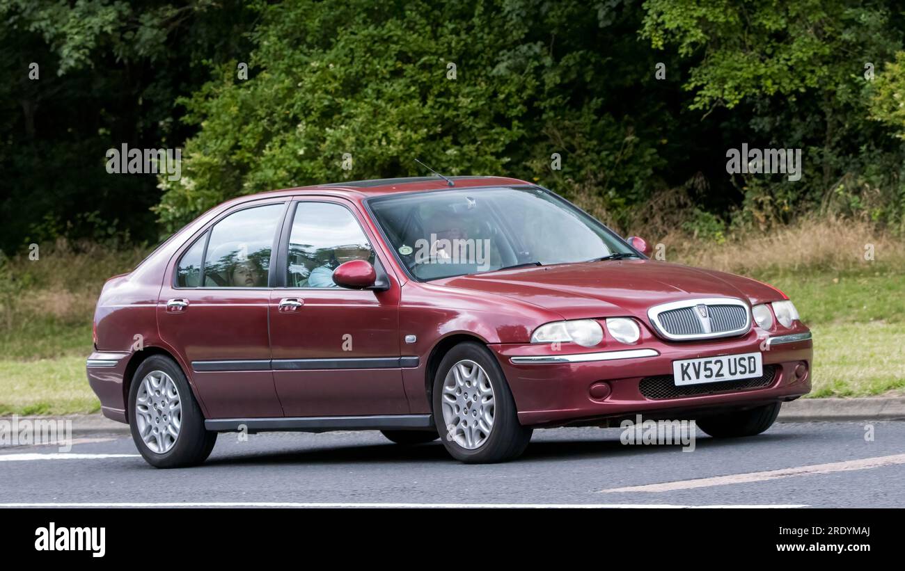 Milton Keynes,UK - July 21st 2023: 2002 red Rover 45 car driving on an ...