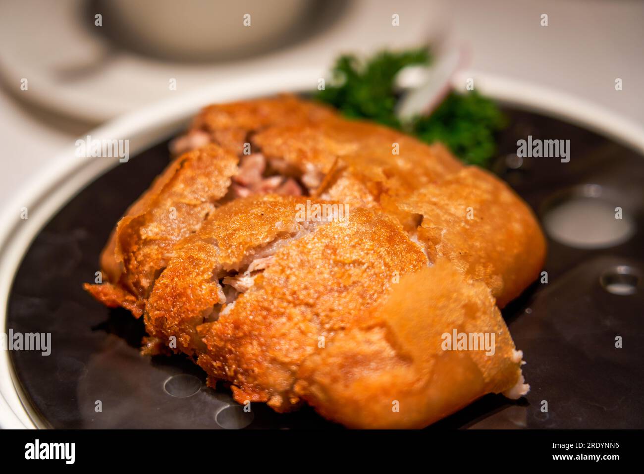 A delicious Chinese Hokkien dish, crispy taro duck Stock Photo - Alamy