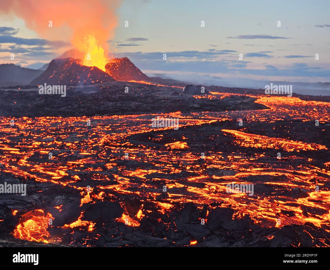 The volcano from a distance. REYKJAVIK, ICELAND: LIVE FOOTAGE of lava ...