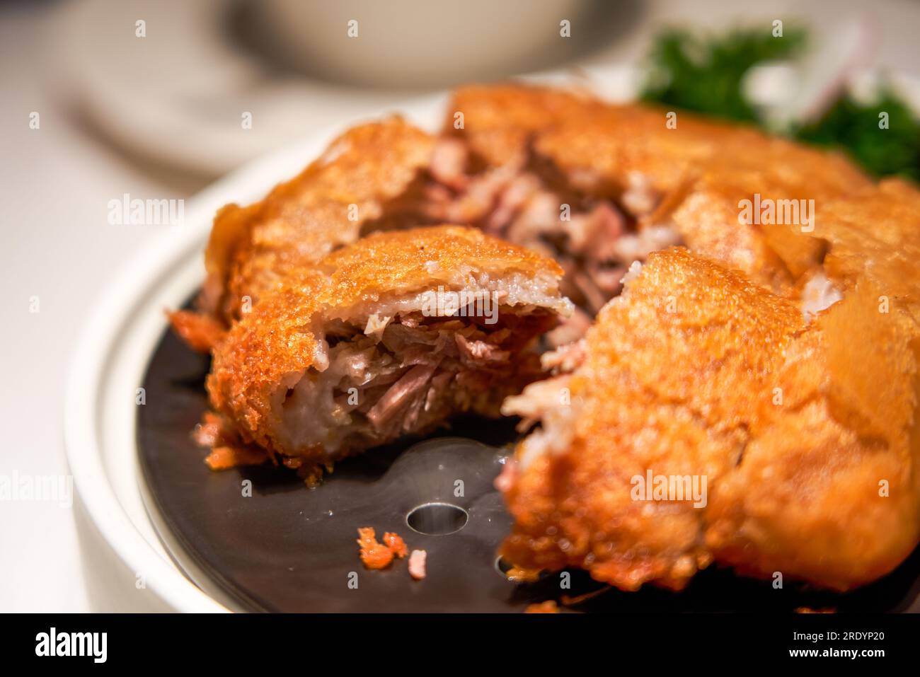 A delicious Chinese Hokkien dish, crispy taro duck Stock Photo - Alamy