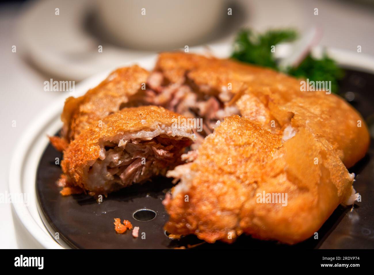 A delicious Chinese Hokkien dish, crispy taro duck Stock Photo - Alamy