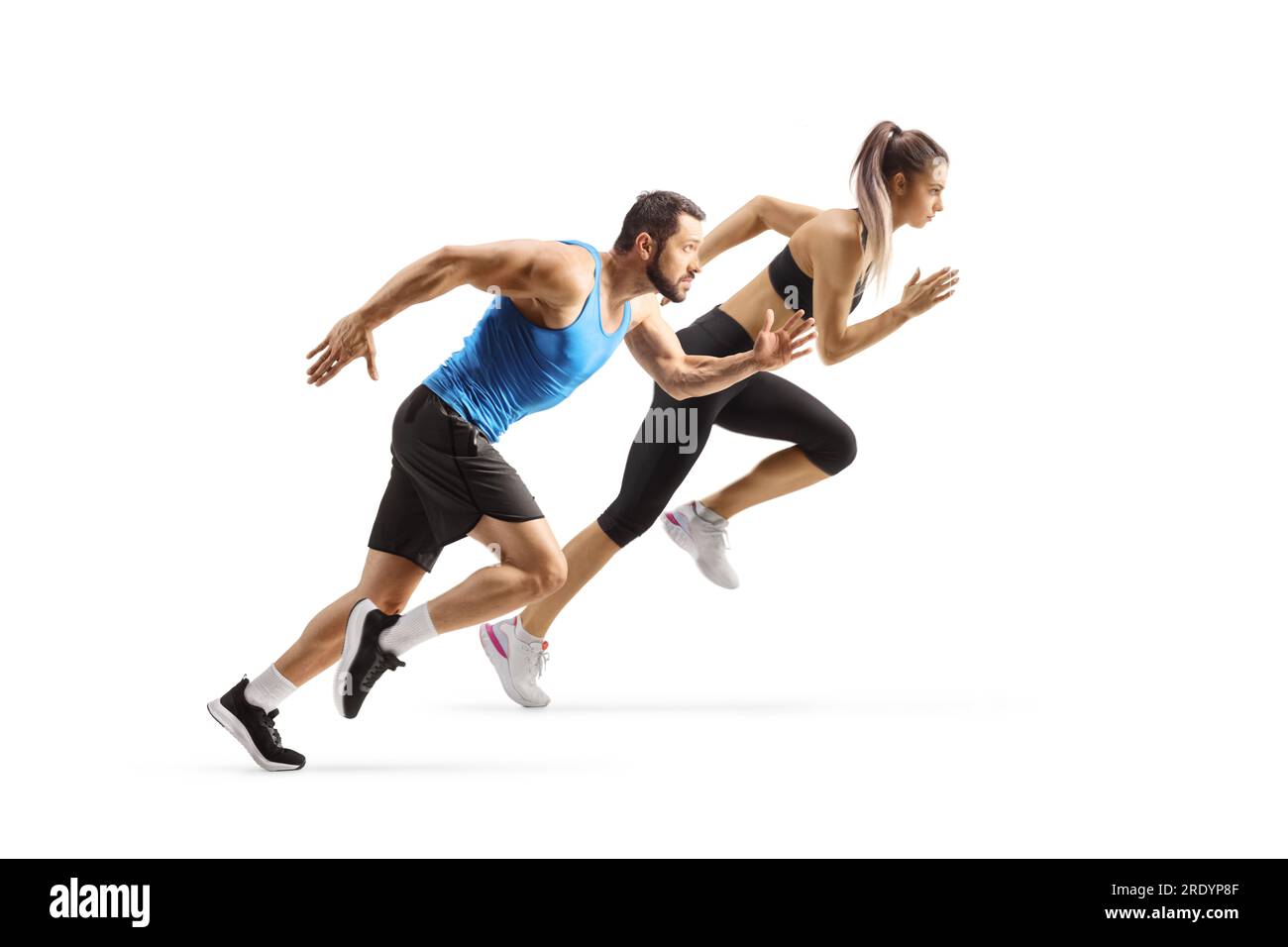 Full length profile shot of a male and female runners isolated on white ...