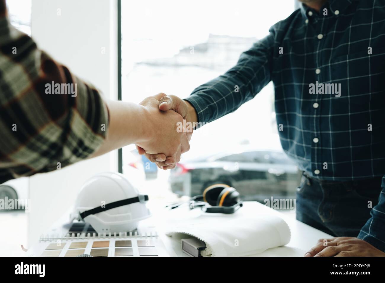 Engineers, designers and interior designers are handshake shack hands ...