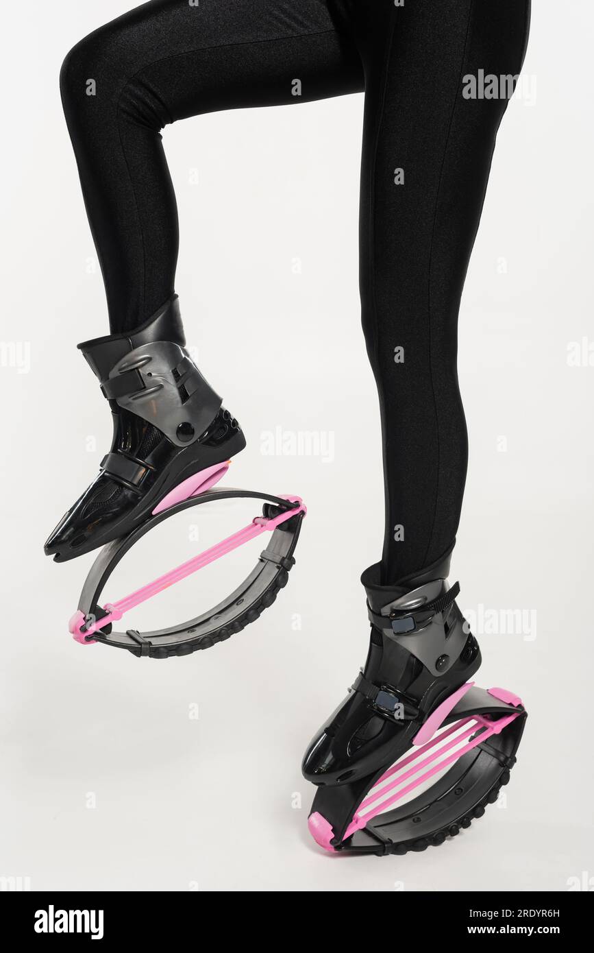 Woman training in kangoo shoes hi-res stock photography and images - Alamy