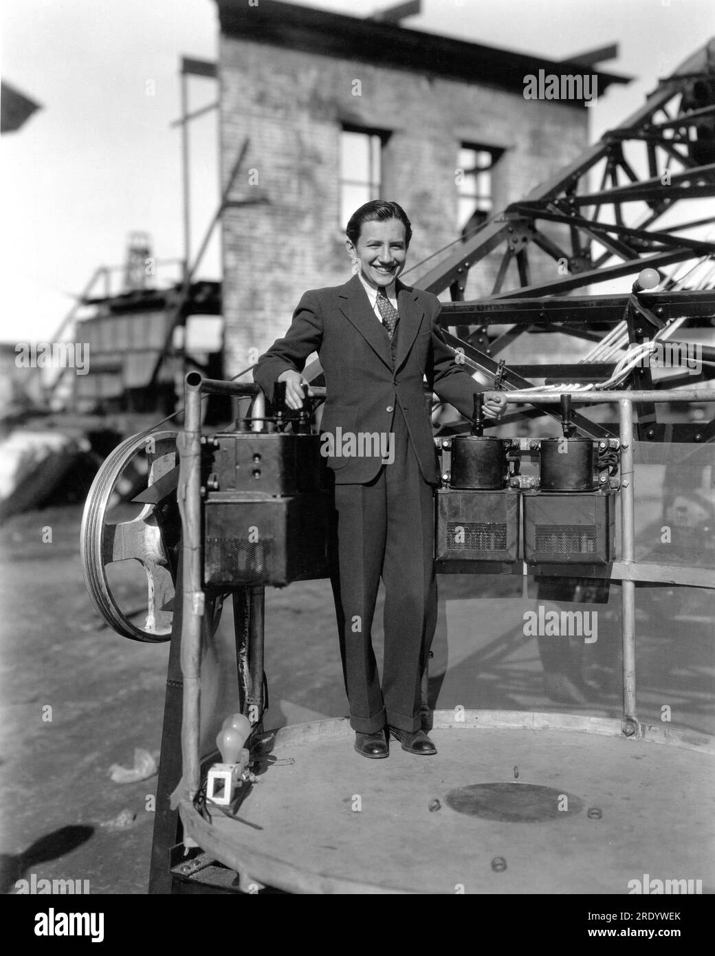 Producer CARL LAEMMLE Jr. poses on the platform of the 'Broadway ...