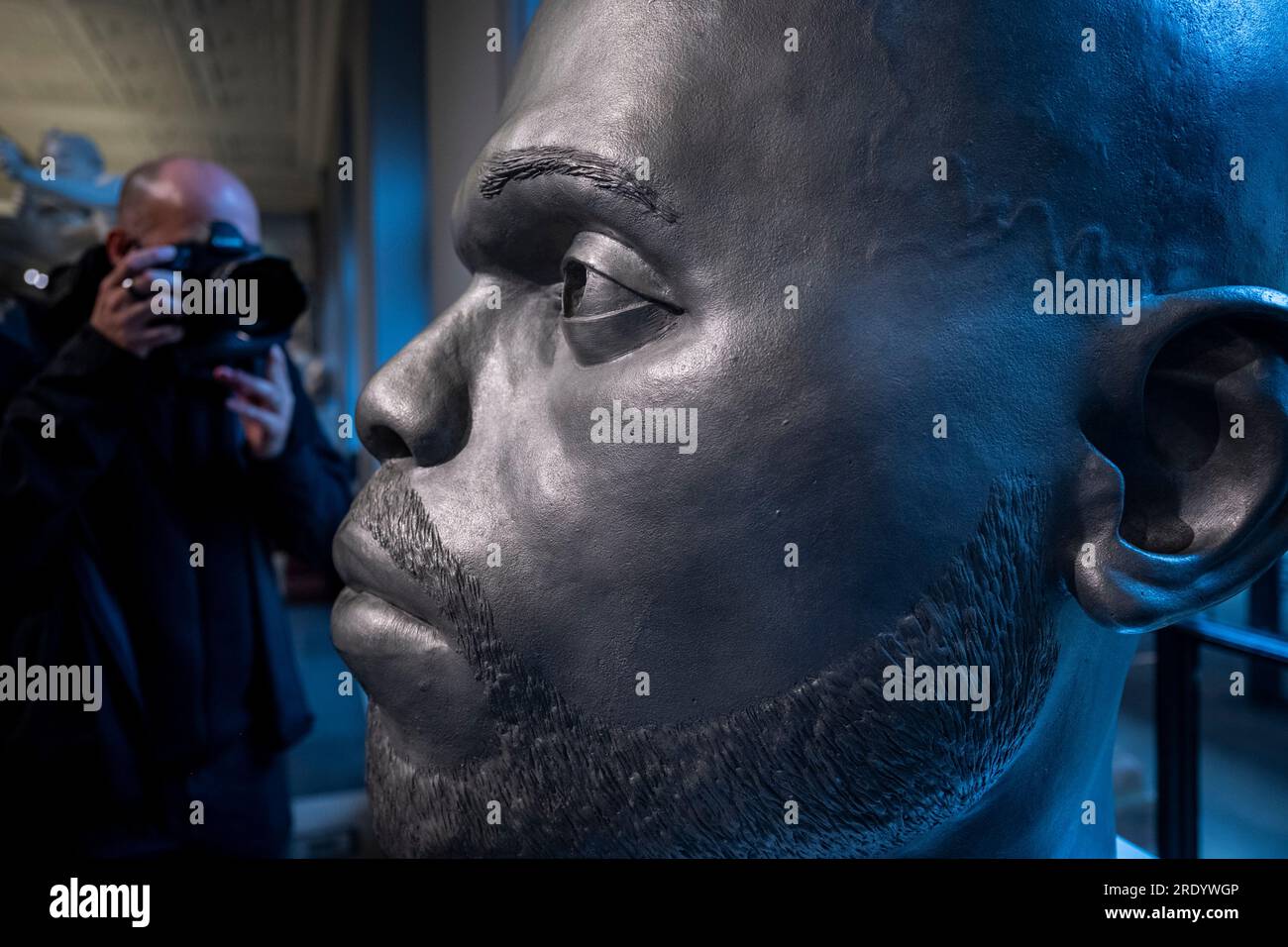 London, UK. 24 July 2023. A photographer with 'Numen (Shifting Votive ...