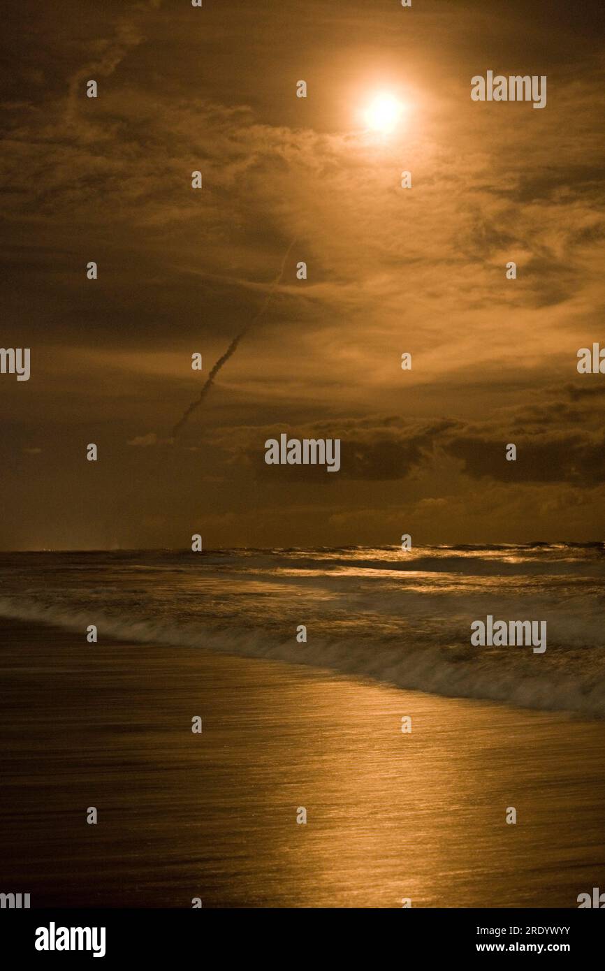 The Space Shuttle Discovery night launch in Cape Canaveral, Florida on ...