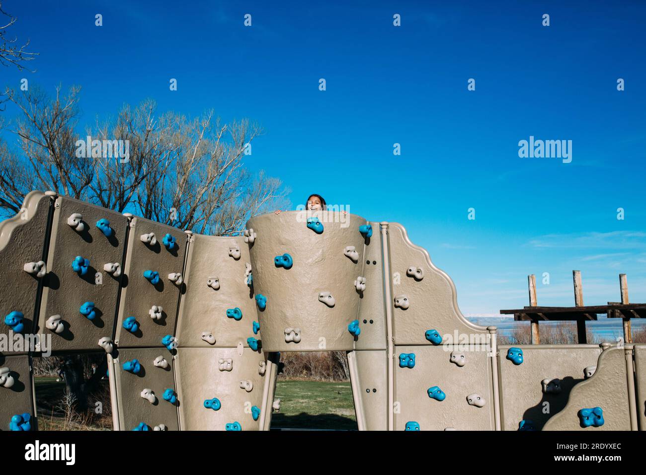 Person climbing over wall hi-res stock photography and images - Alamy
