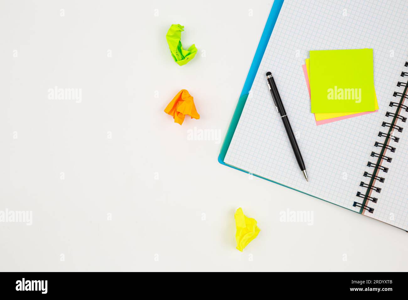 Notebook, pen and paper colored reminders on a white background Stock ...