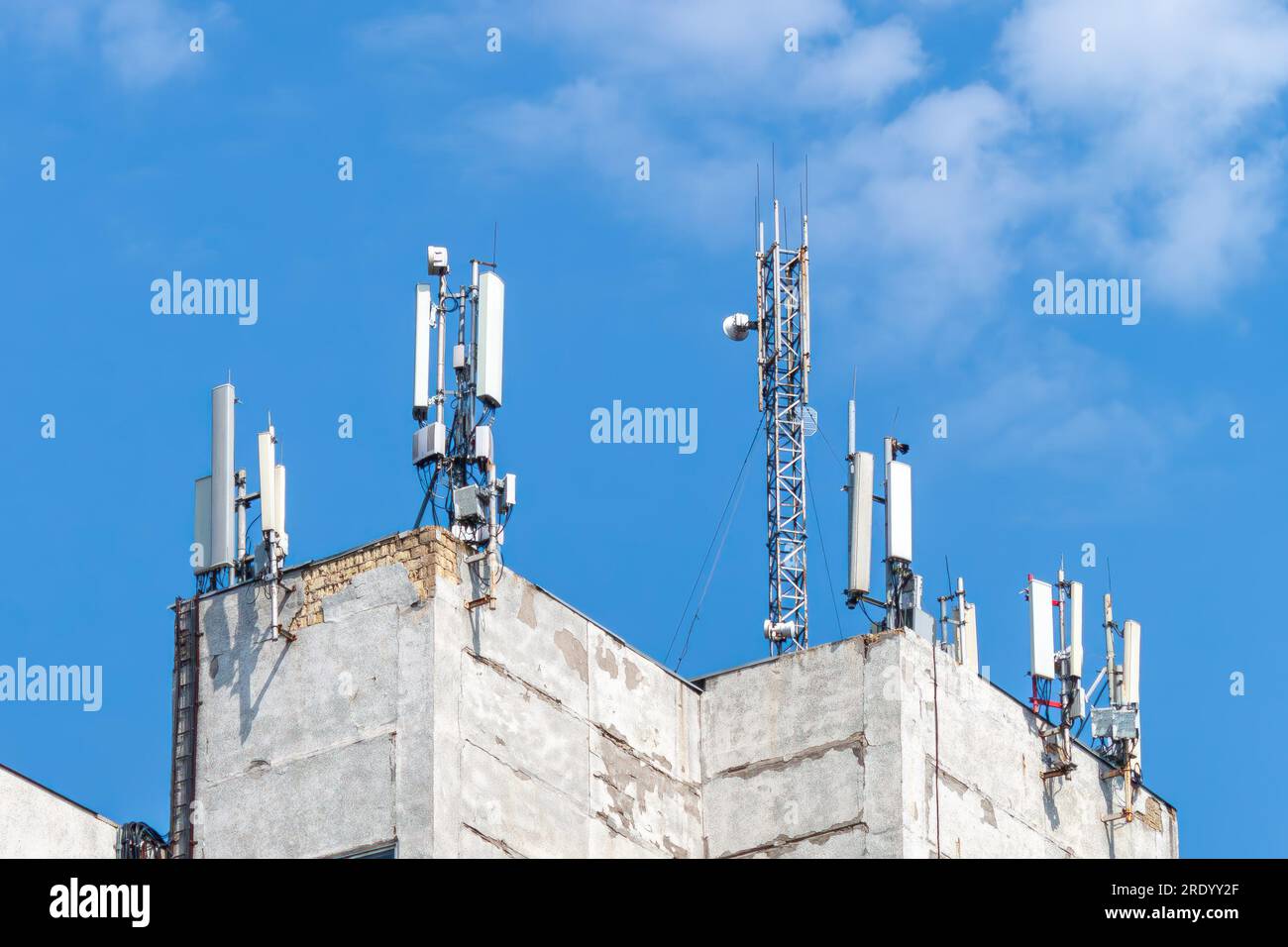 5g cellular antennas on the roof of the house Stock Photo - Alamy