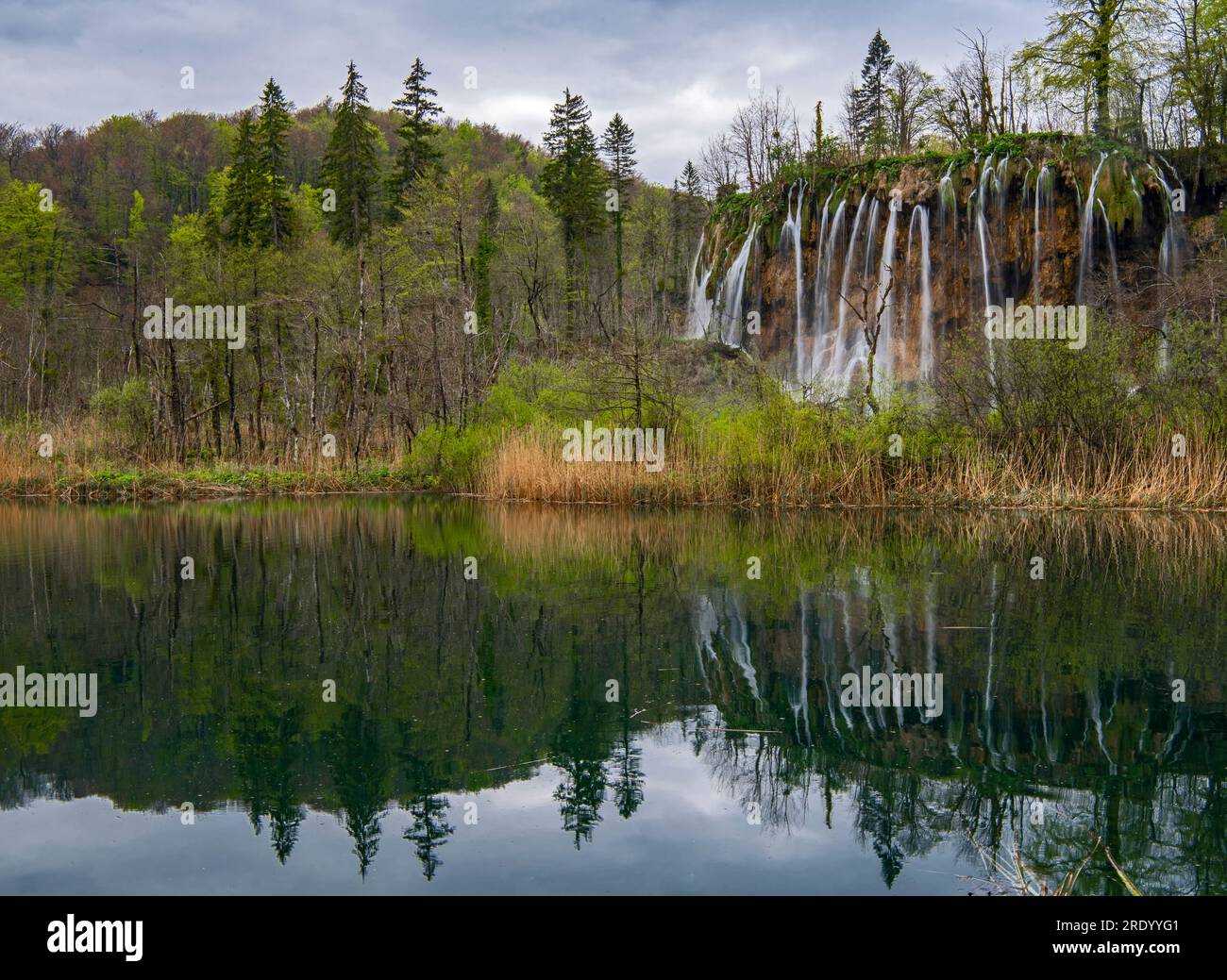 Still lake and waterfall at Plitvice Lakes National Park Stock Photo ...
