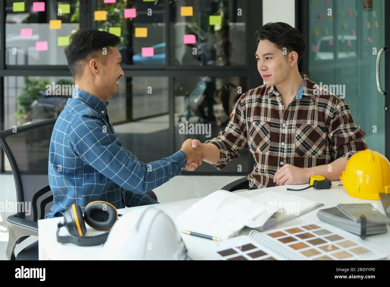 Engineers, designers and interior designers are handshake shack hands ...