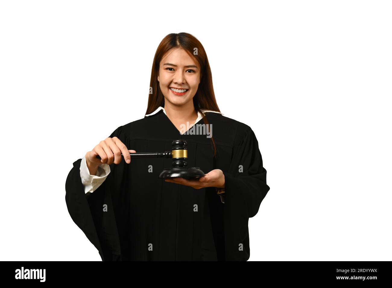 Portrait of judge dressed in robe gown uniform holding gavel hammer ...