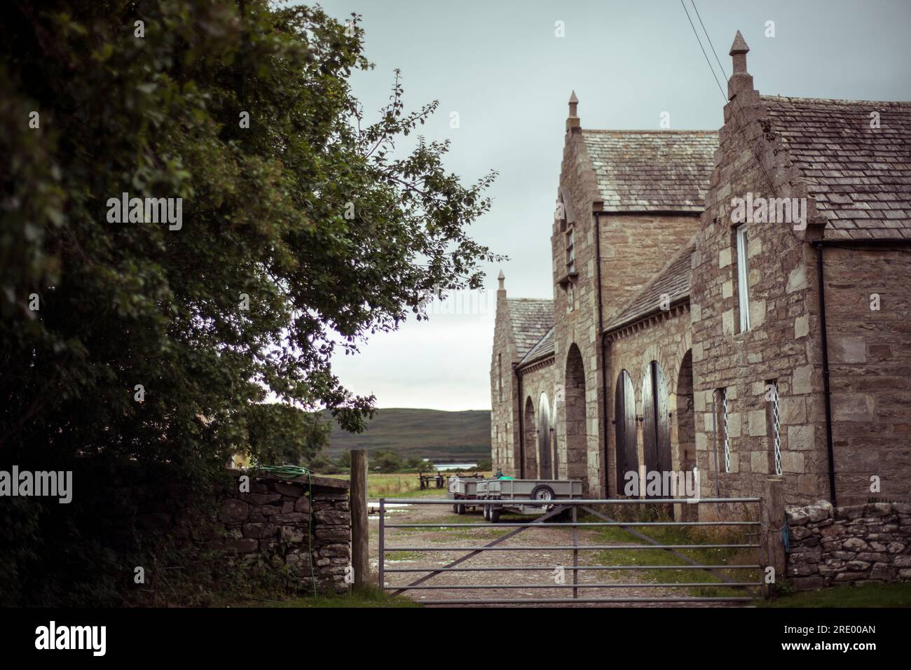 Grand stone mansion stables in remote scotland Stock Photo - Alamy