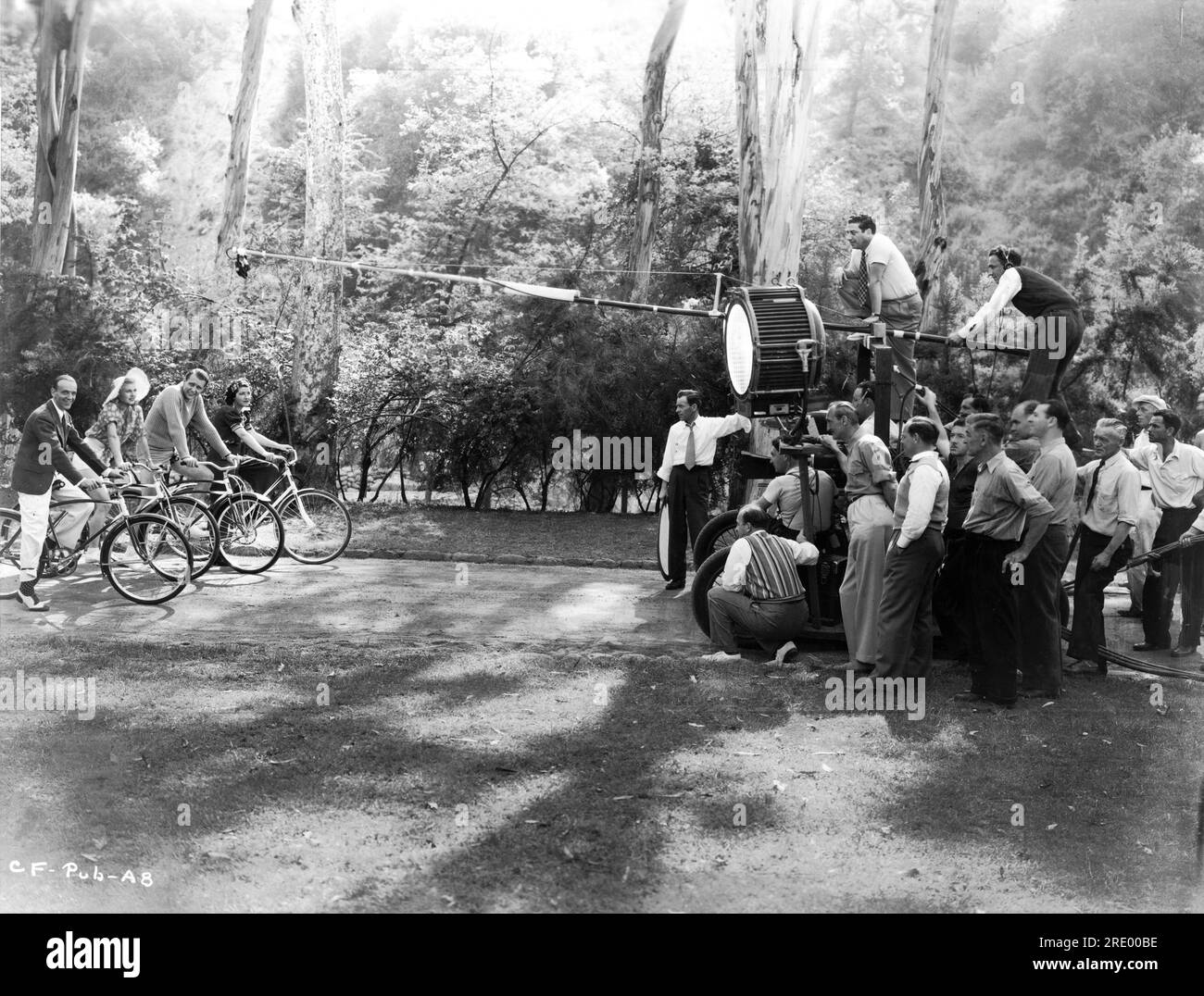 FRED ASTAIRE GINGER ROGERS RALPH BELLAMY and LUELLA GEAR on bicycles on ...