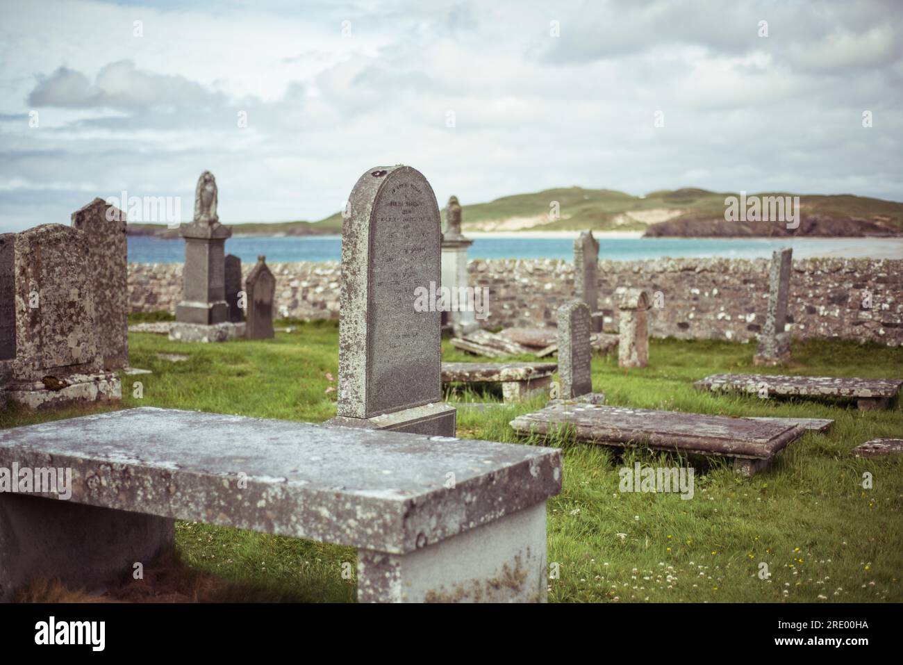 Beautiful stone headstones in graveyard by the ocean Stock Photo - Alamy