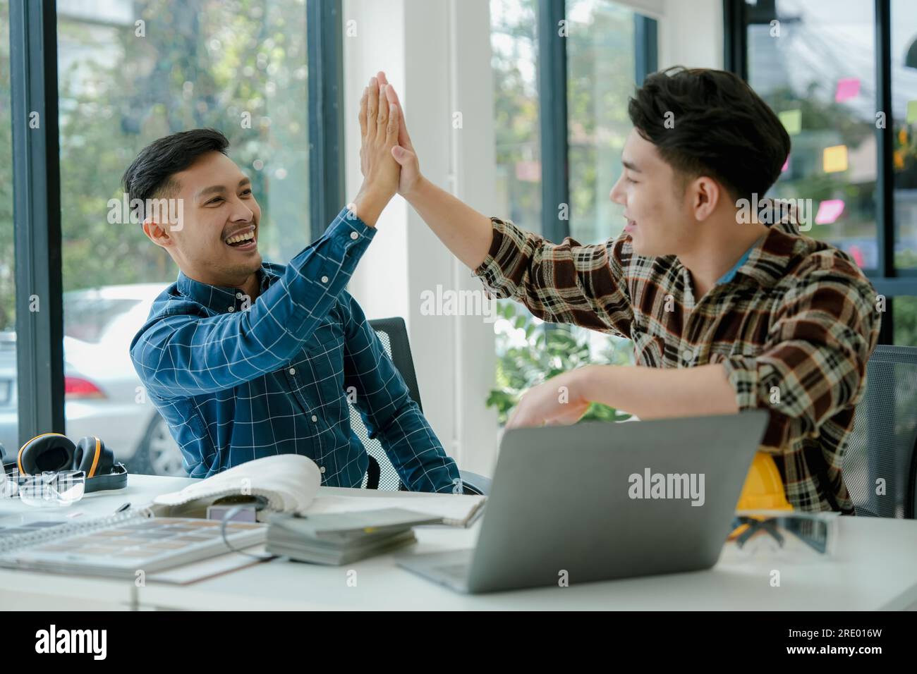 Engineers, designers and interior designers are handshake shack hands ...