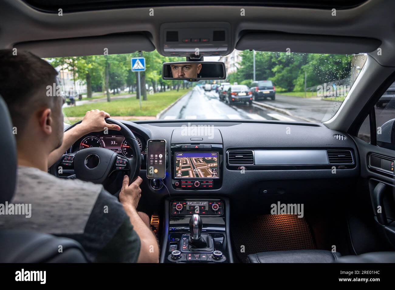 Hands on the wheel when driving from inside the car Stock Photo - Alamy