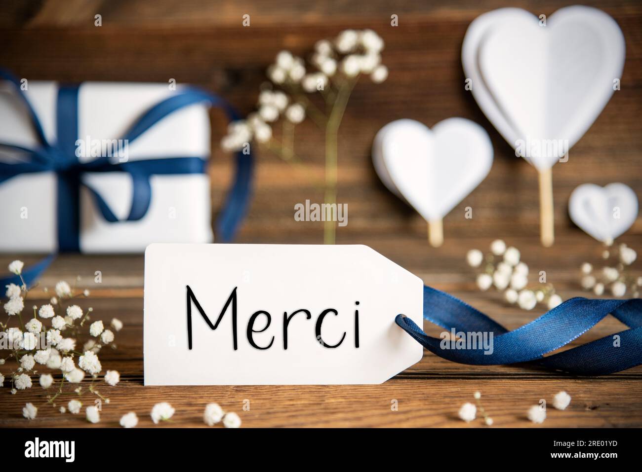 Label With White Heart Decoration, Flower, Gift, Merci Means Thank You ...