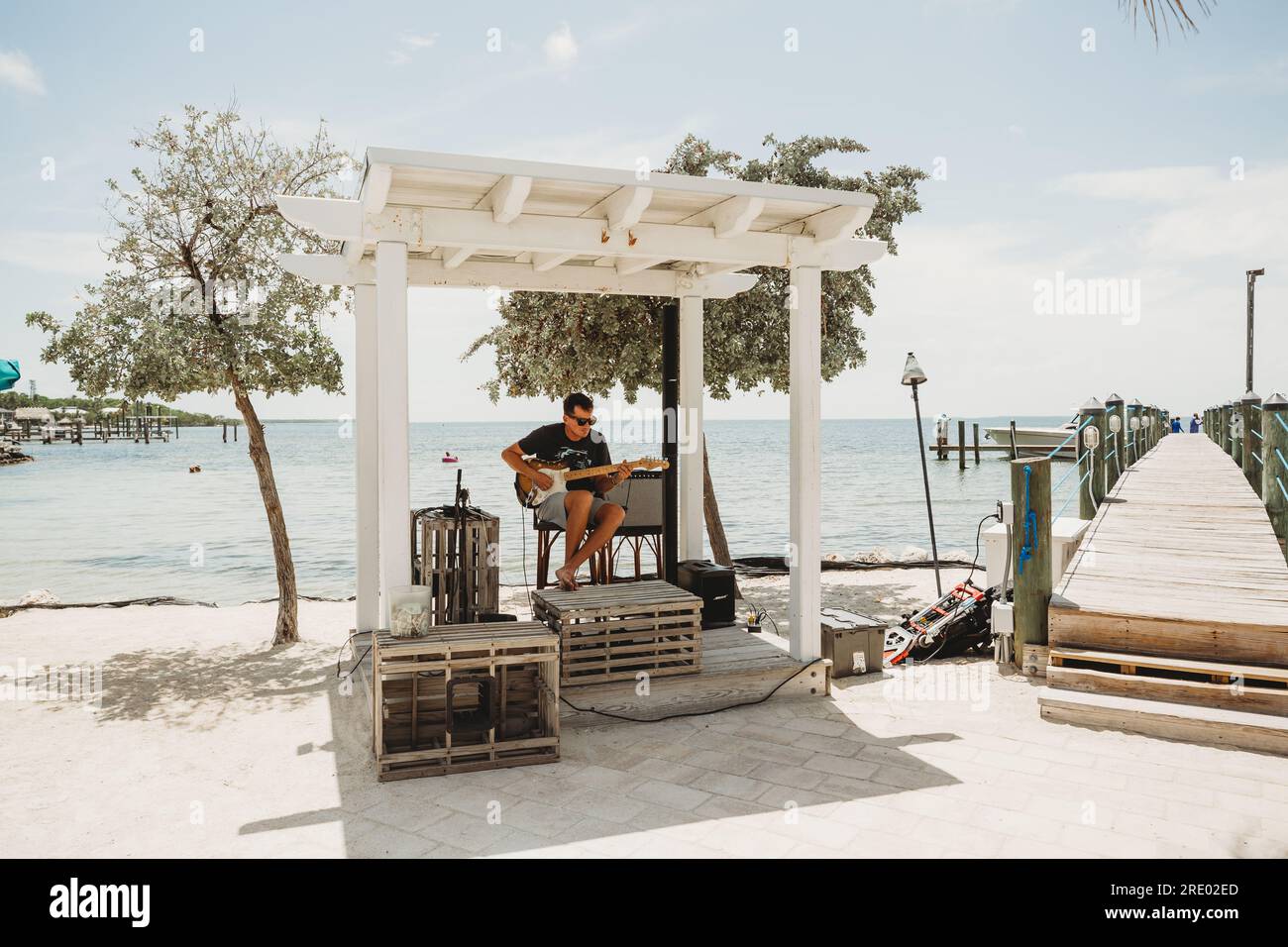Musician Playing the guitar on a hot summer day in the Florida Keys ...