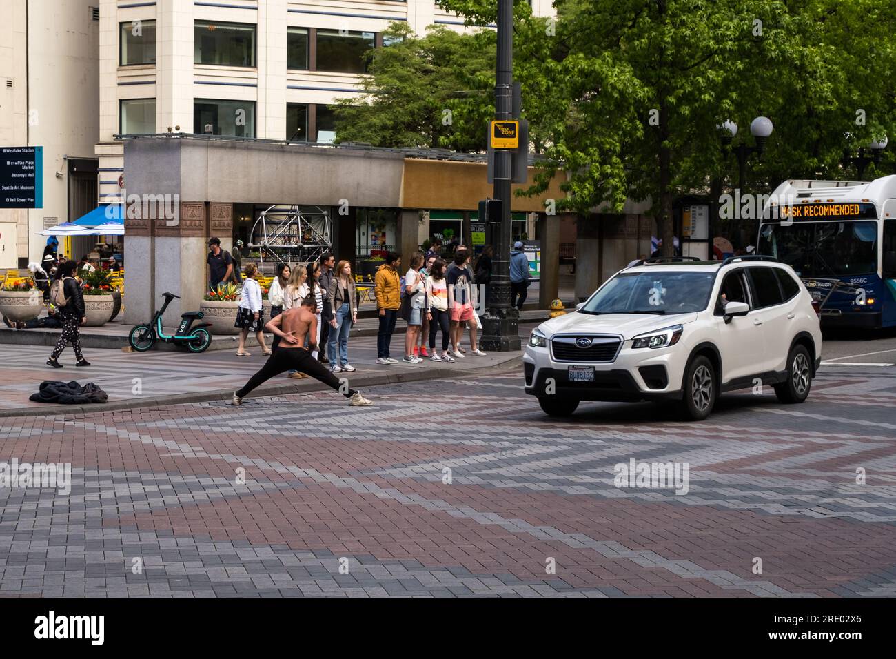 Seattle, USA. 14 Jun, 2023. A person blocking a bus in the Westlake ...