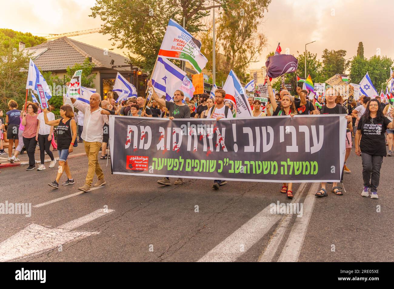 Haifa, Israel - July 22, 2023: People march with anti-occupation signs ...