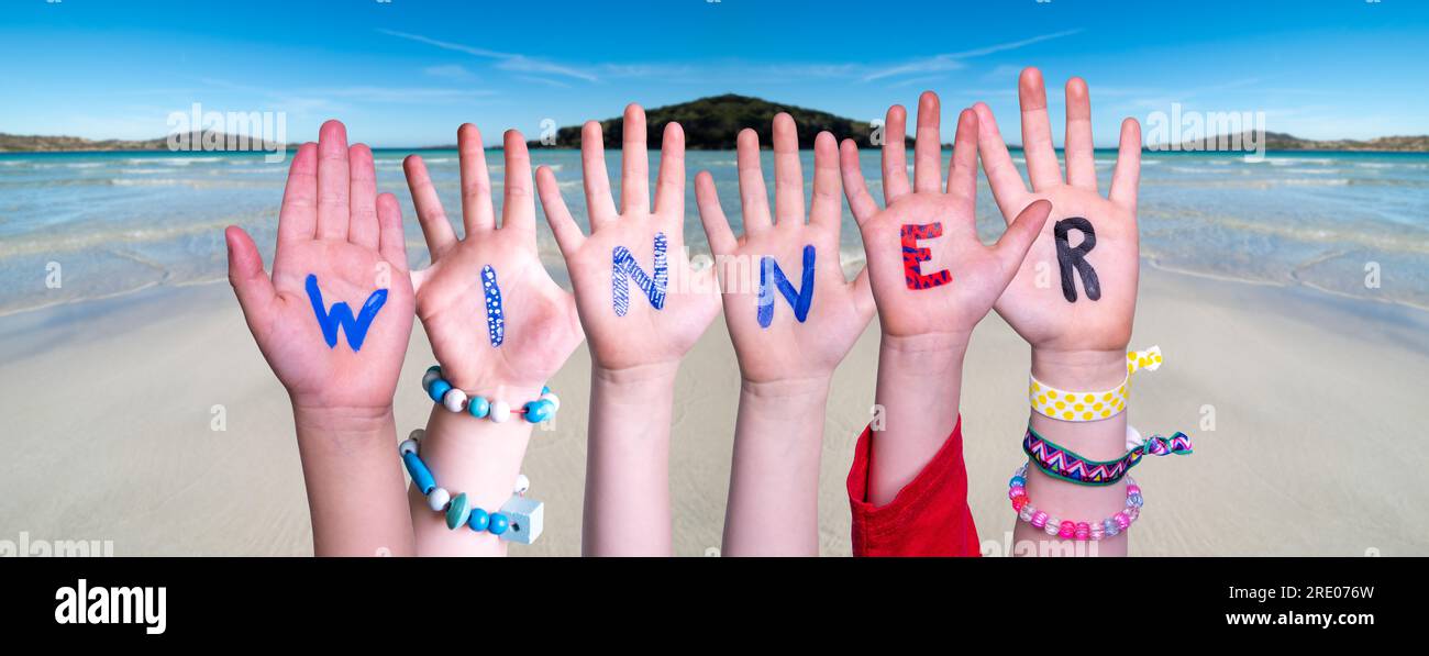 Children Hands Building Word Winner, Sea And Ocean Background Stock ...