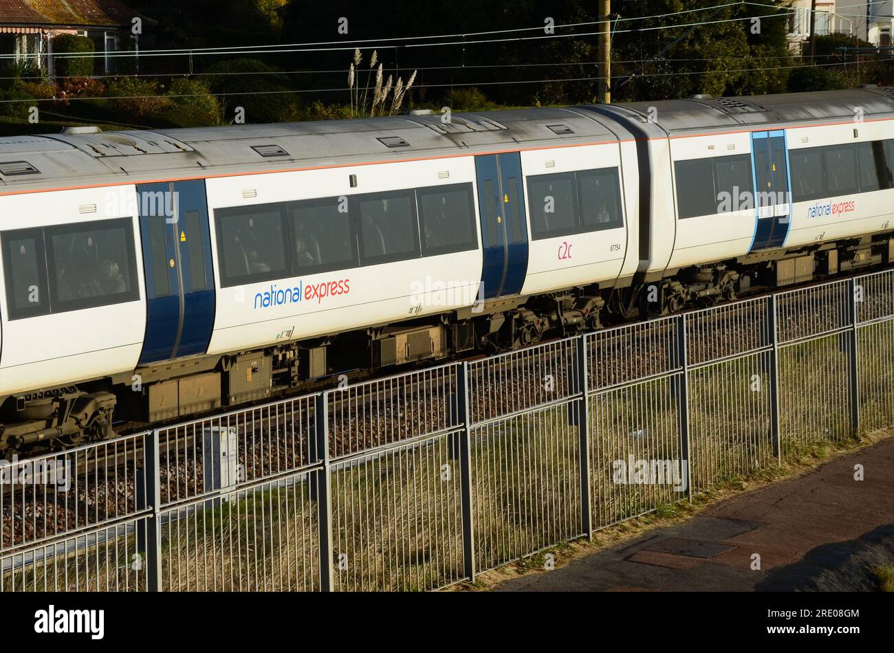 National Express, C2C train passing the coastal cinder path at ...