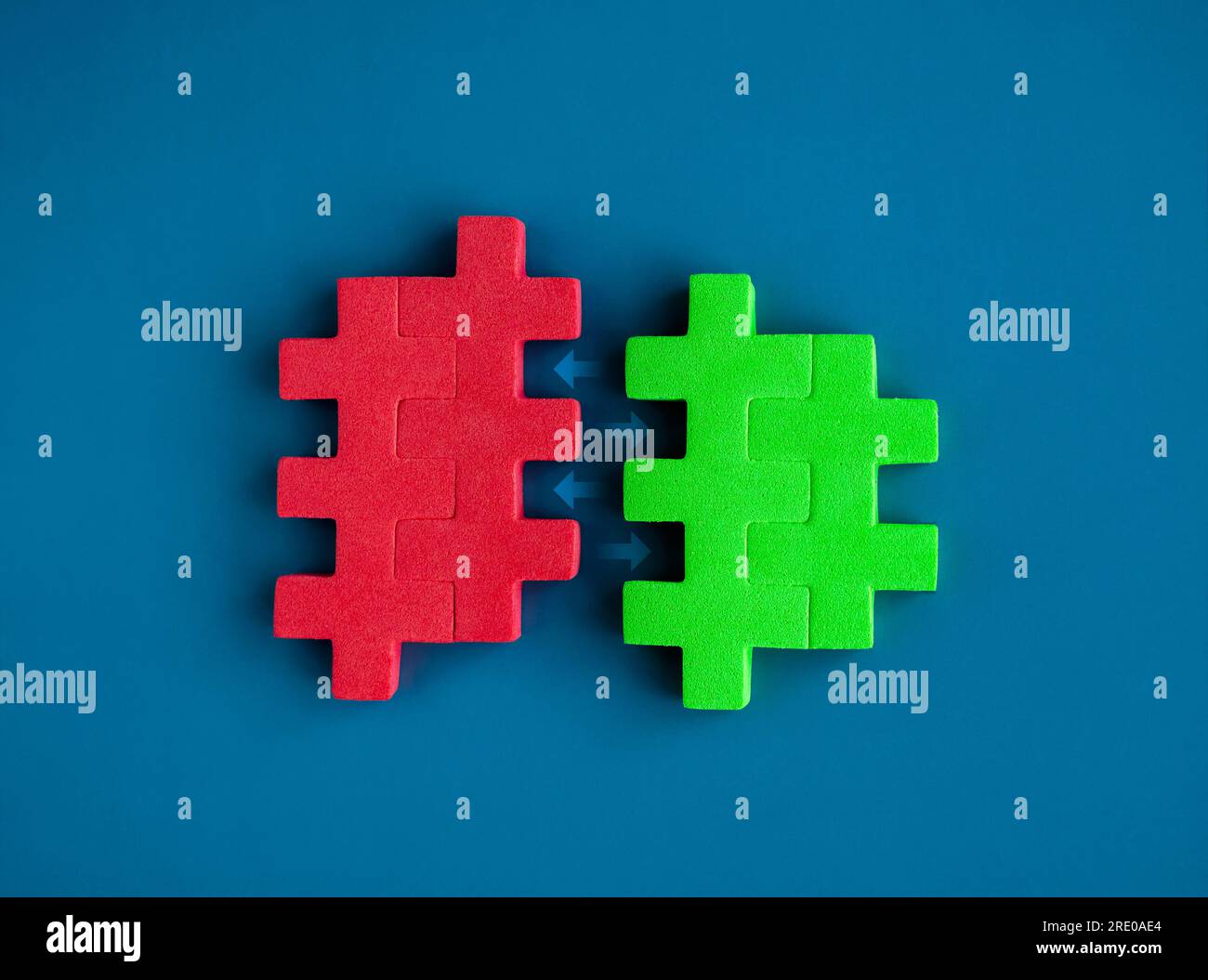 Red and green puzzle blocks between arrows are joining each other on ...
