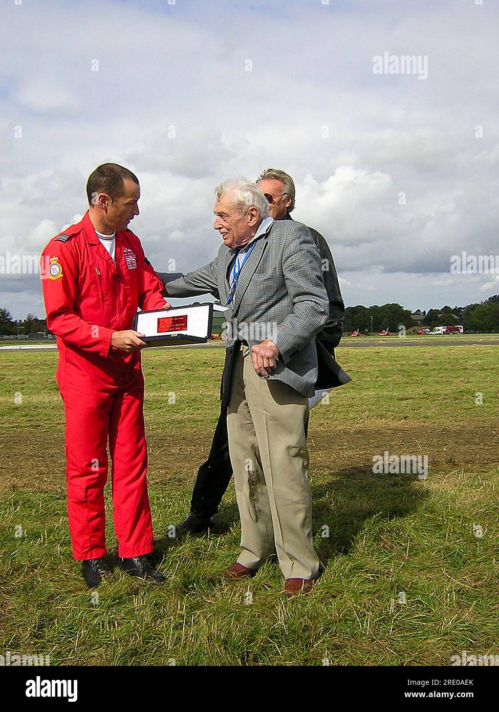 Red Arrows team leader, Red 1, Spike Jepson, presenting commemorative ...