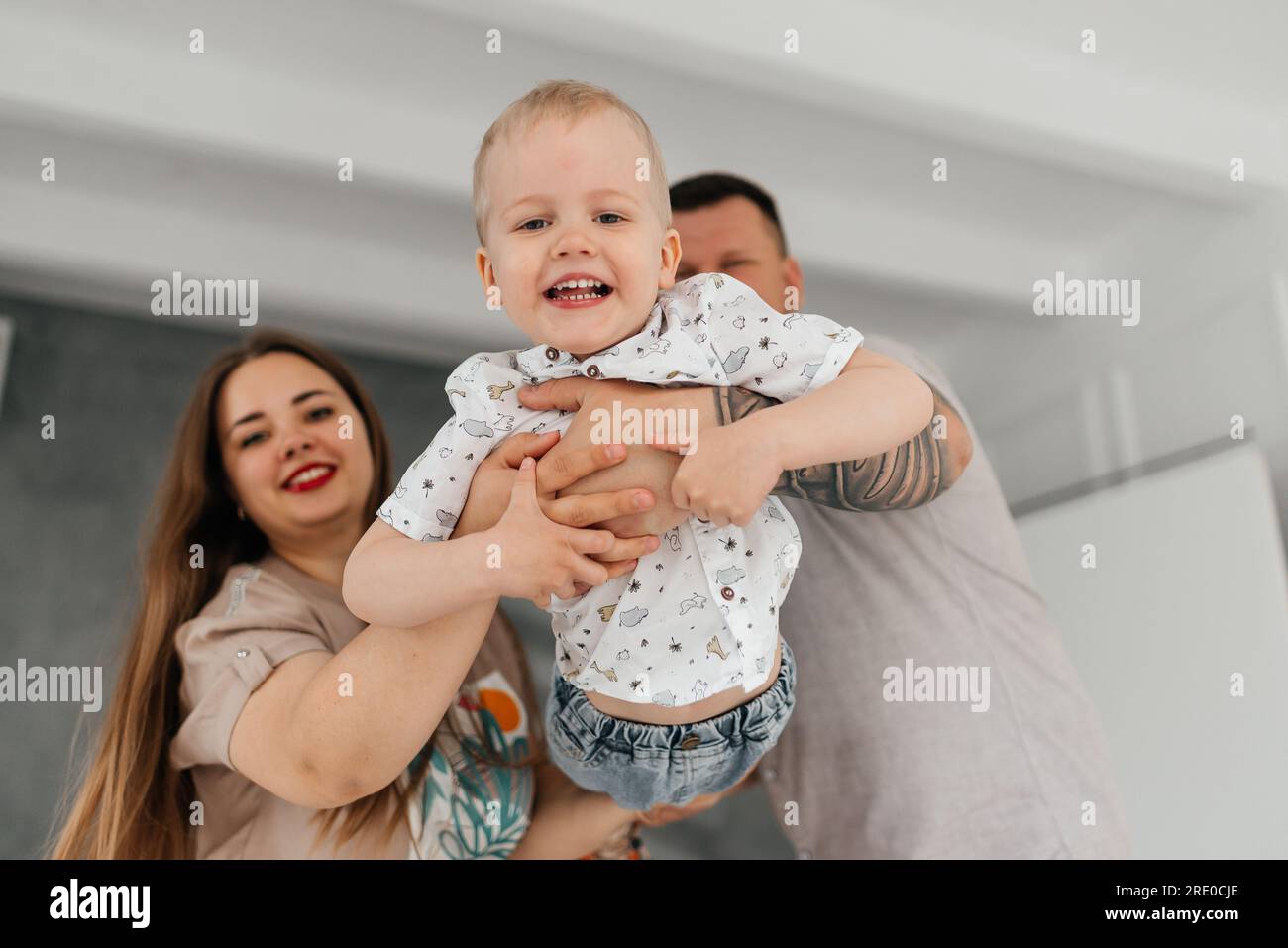 Happy family having fun time at family photo shoots Stock Photo - Alamy