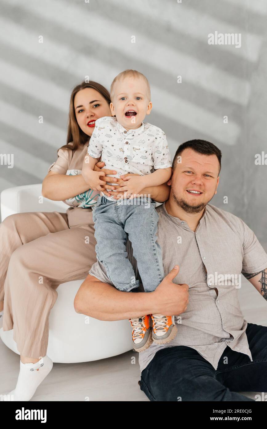 Happy family having fun time at family photo shoots Stock Photo - Alamy