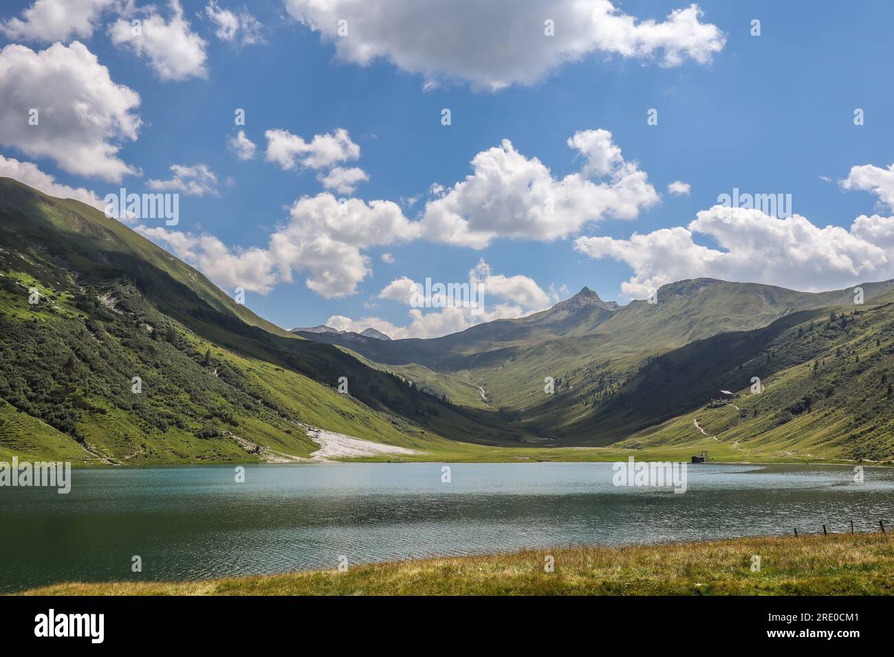 Alpine Lake with Hilly Landscape in Austria. Tappenkarsee with Green ...