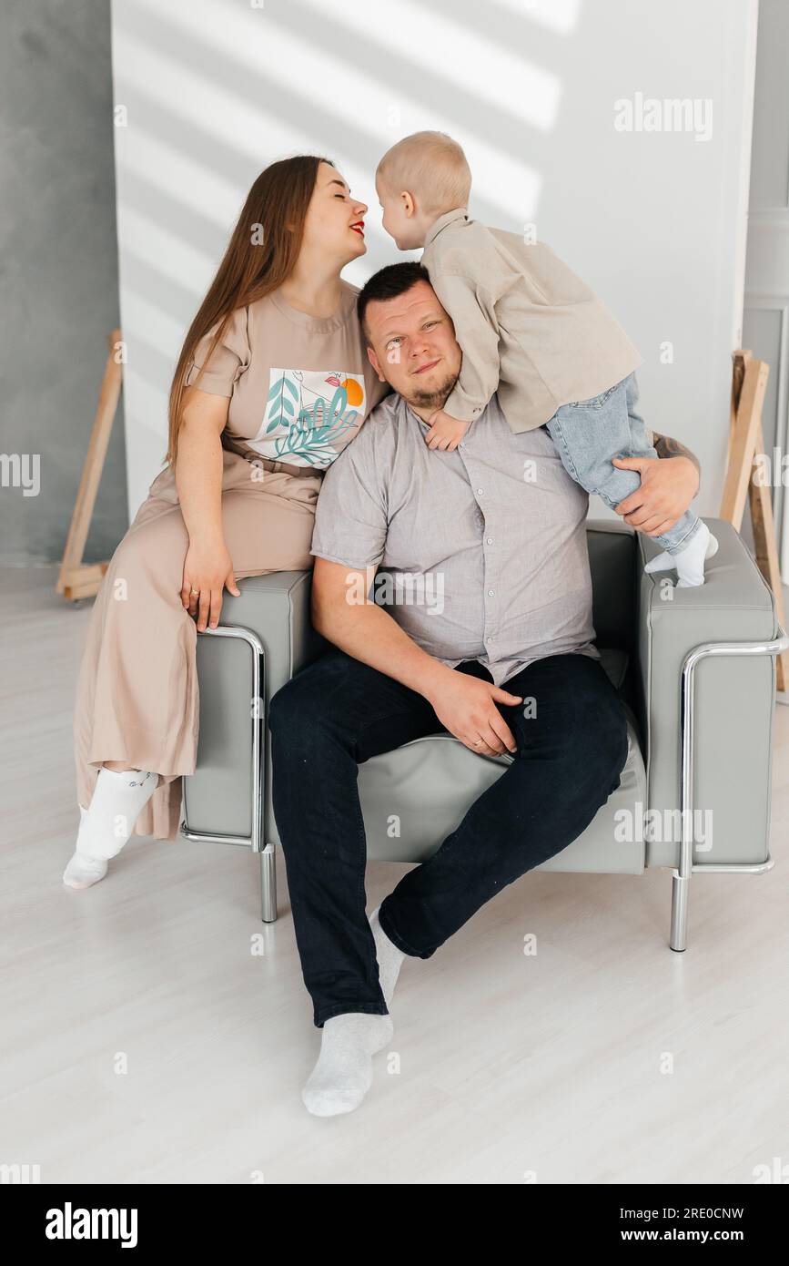 Happy family having fun time at family photo shoots Stock Photo - Alamy
