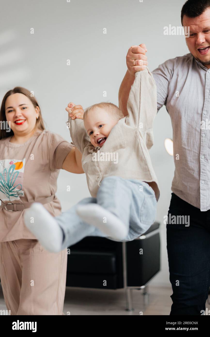 Happy family having fun time at family photo shoots Stock Photo - Alamy