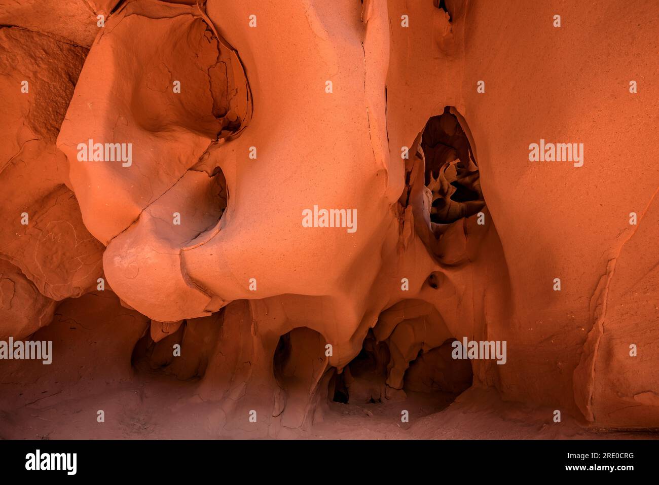 Can Riera caves and its surroundings, formed by the erosion of reddish clays and sedimentary ...