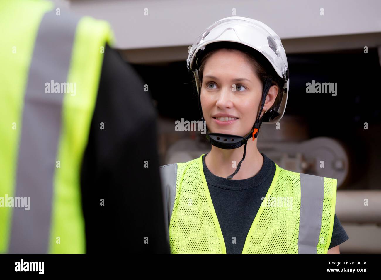 Young caucasian engineer man and woman meeting and checking electric ...