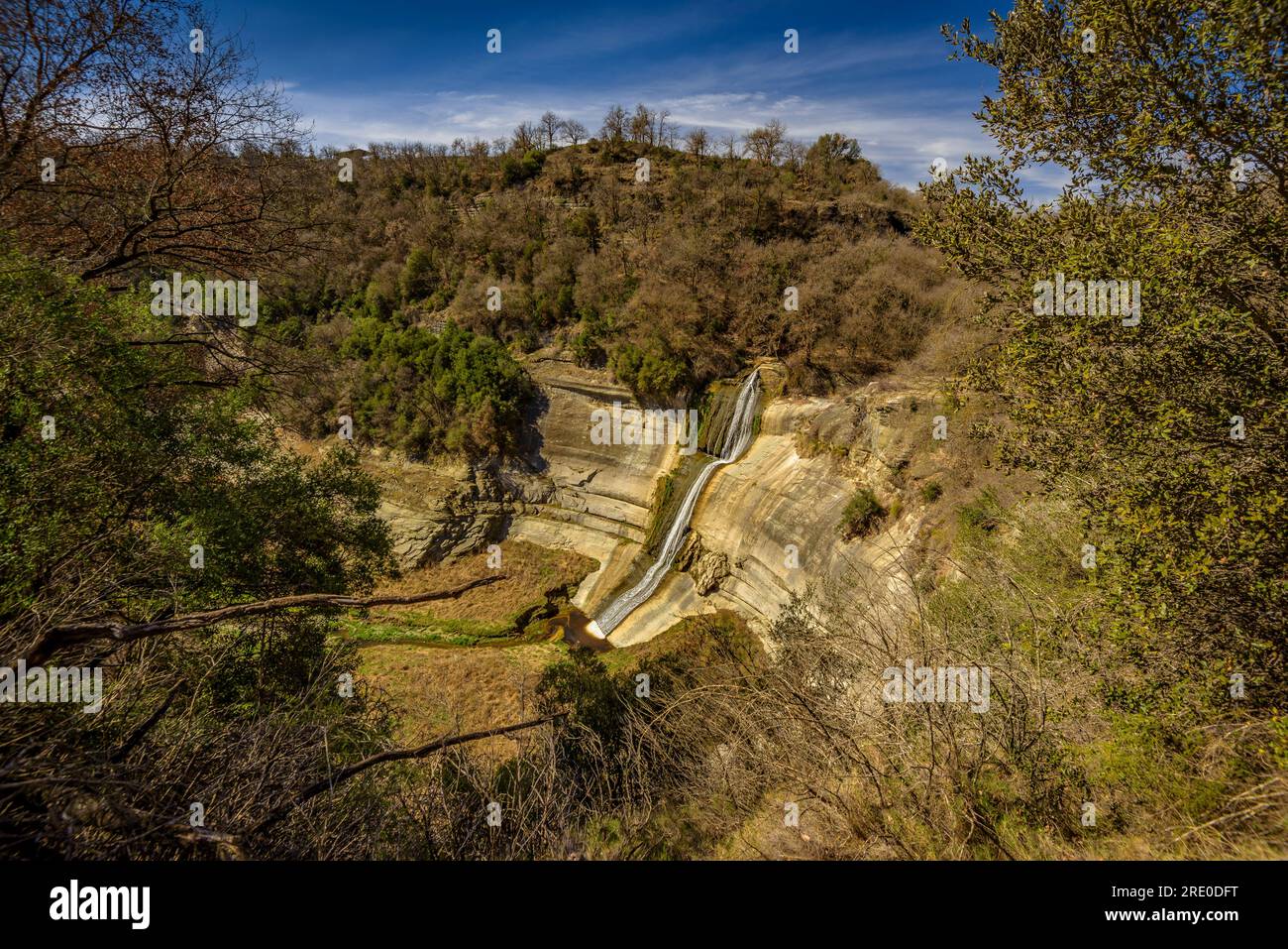 Salt del Cabrit waterfall and surroundings with the dry Sau reservoir ...