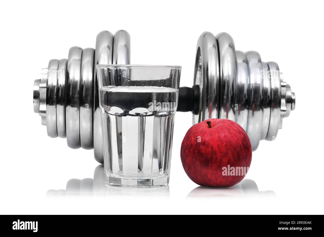 dumbbell, cup and apple on a white background Stock Photo - Alamy
