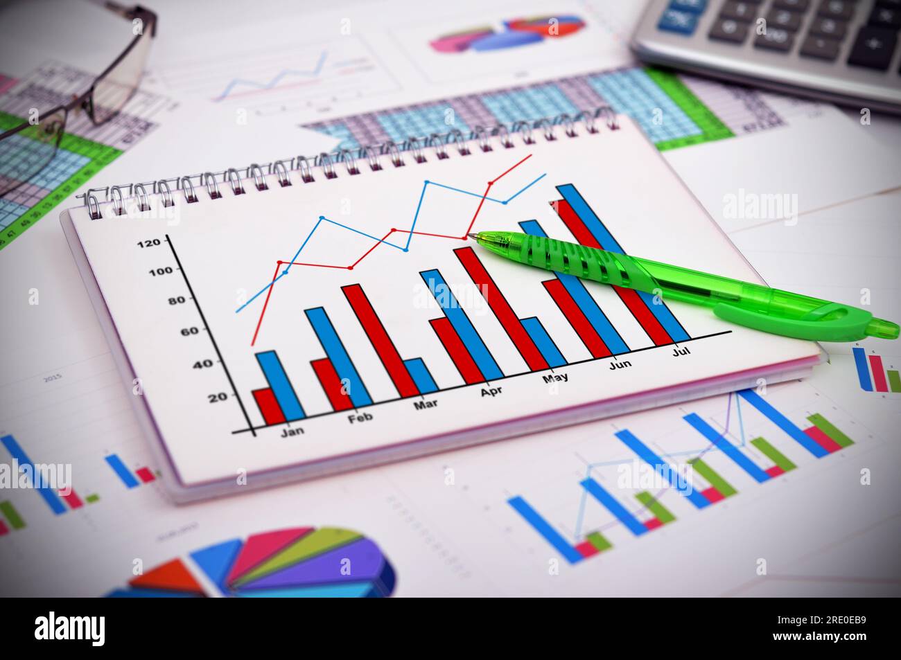 notebook with drawing chart and financial charts Stock Photo - Alamy