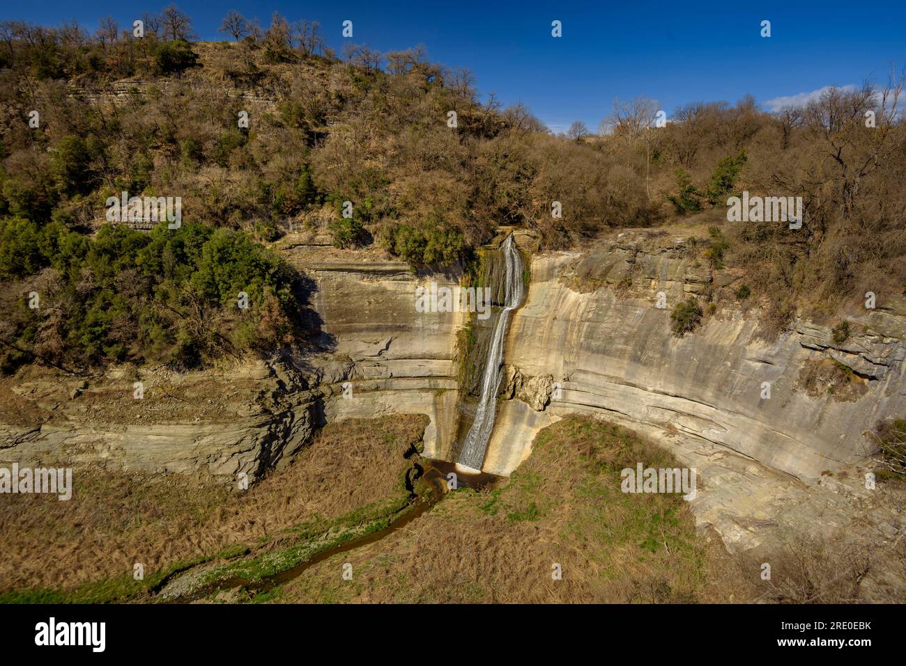 Salt del Cabrit waterfall and surroundings with the dry Sau reservoir ...